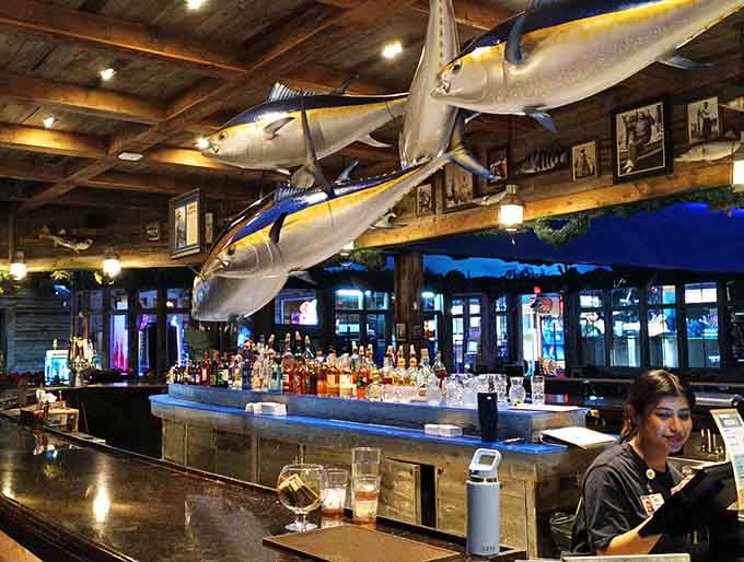 The bar features marlin sculptures overhead, ensuring your cocktail comes with a side of maritime majesty and conversation.