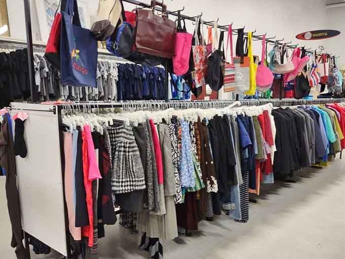 Purses dangle overhead like fashion fruit, ripe for picking by shoppers with excellent taste and sense.