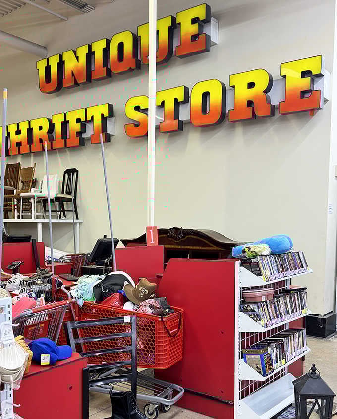 The iconic Unique Thrift Store sign presides over a kingdom of secondhand treasures and donation carts.