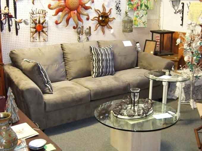 The perfect living room setup awaits. That glass coffee table has probably held everything from TV dinners to cocktail parties.