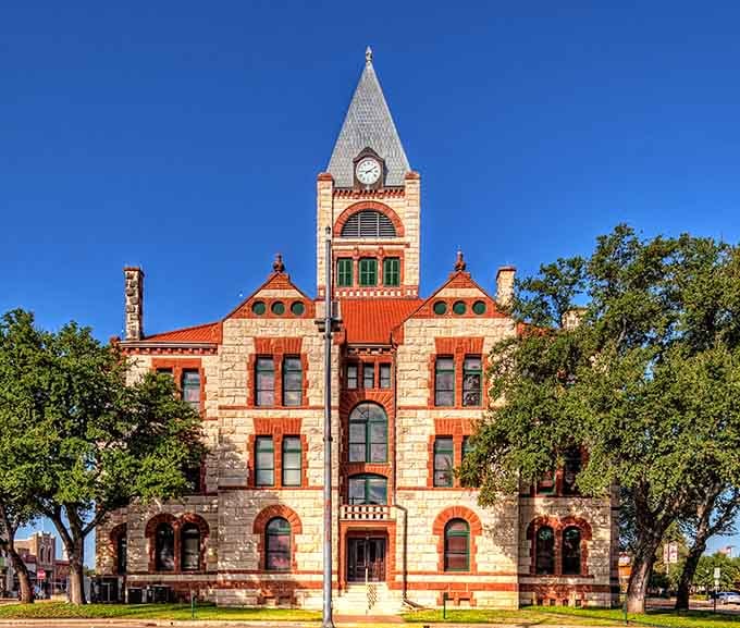 The courthouse's front facade captures that perfect balance of governmental authority and architectural whimsy&mdash;like a stern judge who secretly collects comic books.