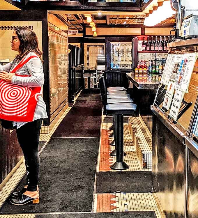 The narrow passageway feels like a time tunnel where modern food trends dare not enter and tradition reigns supreme.