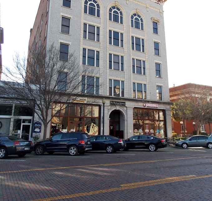 This historic building towers over downtown like a distinguished elder statesman, its white facade gleaming in the Georgia sunshine.