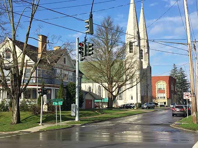 Steepled elegance meets small-town charm where Olean's historic church spires reach skyward, reminding us that architectural grandeur isn't exclusive to metropolitan cathedrals.