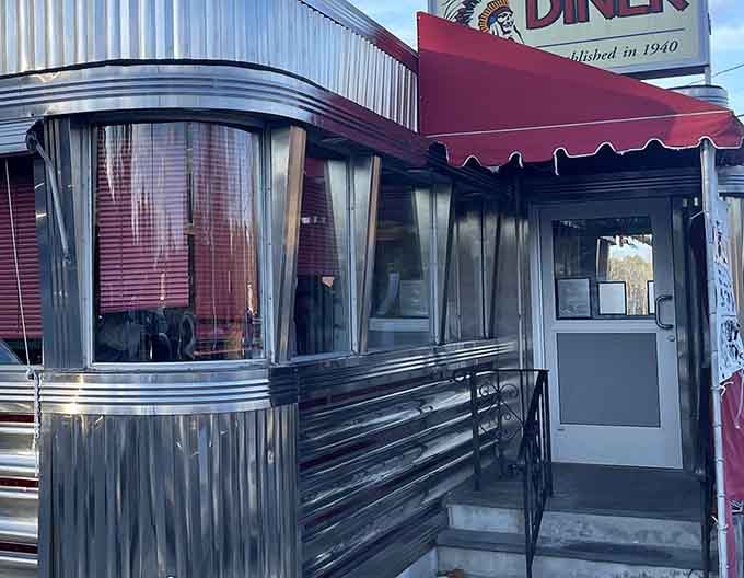 The entrance beckons with all the charm of a bygone era. That curved glass and stainless steel exterior says, "Come in, the meatloaf is waiting."