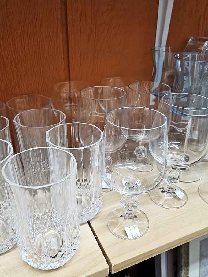 Crystal clarity amid the chaos! These elegant glasses await their next toast, proving secondhand doesn't mean second-best.