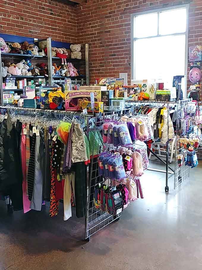 The kids' section bursting with colorful clothes and toys, proving sustainable shopping works for every family member beautifully.