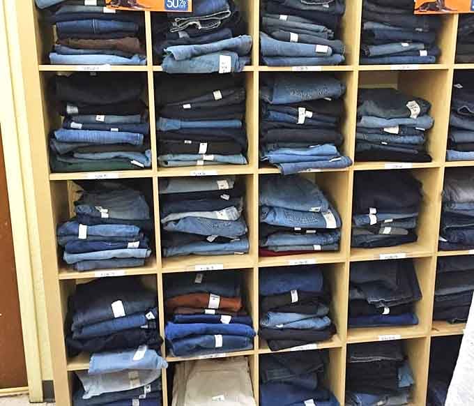 Denim organized with military precision. Finding your perfect pair feels like striking gold in the Sandia Mountains&mdash;unexpected and absolutely thrilling.
