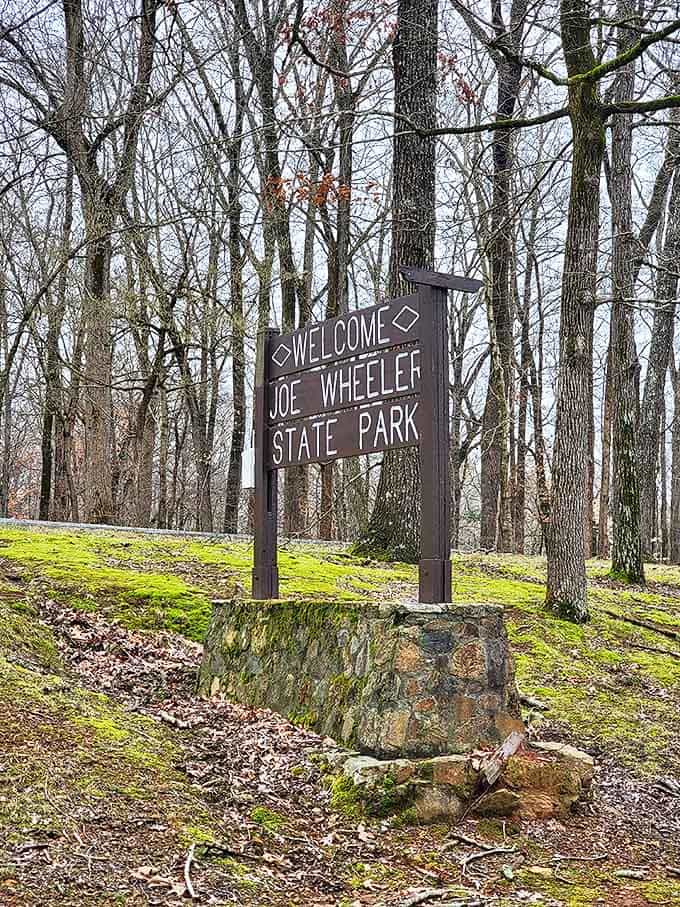 The lodge glows like a beacon at twilight. Its impressive architecture combines rustic charm with modern comfort, welcoming weary travelers.