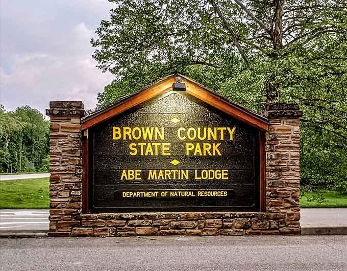 The gateway to Indiana's natural crown jewel. This sign promises adventures that websites can describe but only footsteps can discover.
