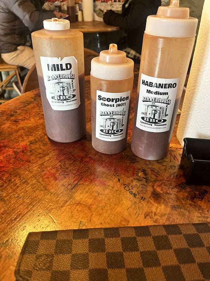 The sauce trinity &ndash; mild, hot, and "why is my face melting?" Each squeeze bottle contains liquid personality waiting to complement your barbecue journey.