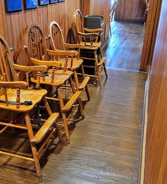 A row of wooden high chairs stands ready, waiting for the next generation of pie enthusiasts to join the family tradition.