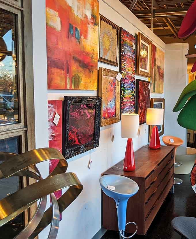 A gallery wall that turns "I don't know much about art" into "I suddenly need that orange abstract in my life immediately."