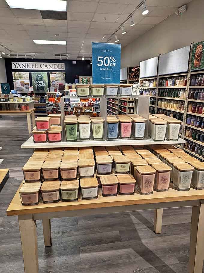 Yankee Candle's display is an altar to artificial scents. These waxy temples of fragrance promise to transform your home into whatever seasonal fantasy you're chasing.