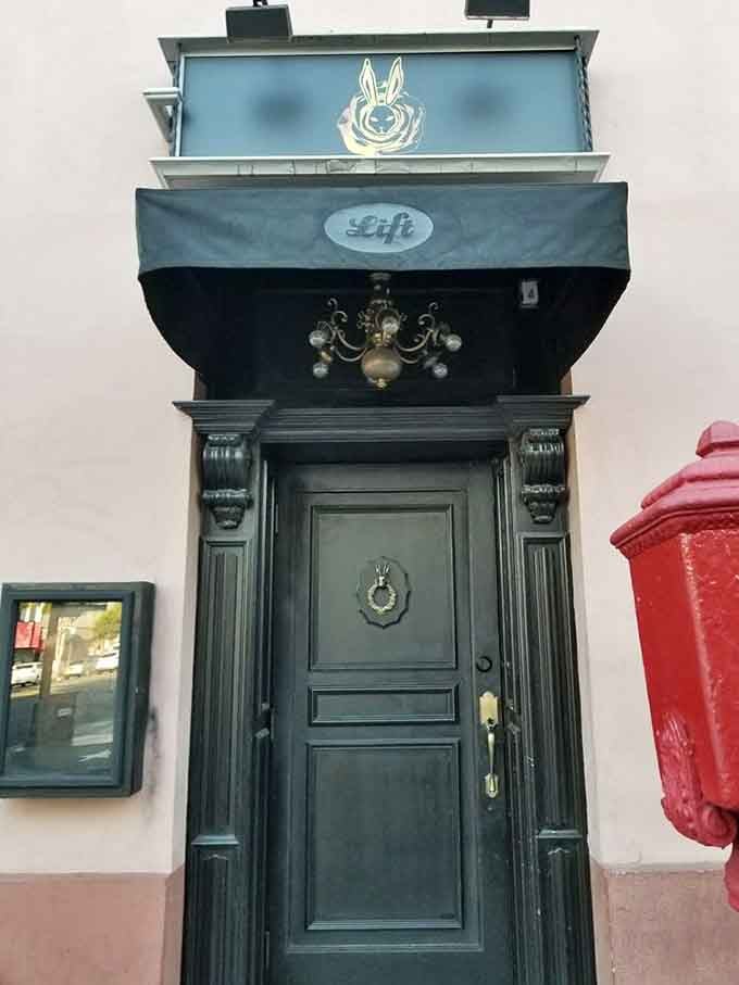 That ornate entrance looks like something from Mary Poppins' more mysterious cousin—elegance meets intrigue behind this door.