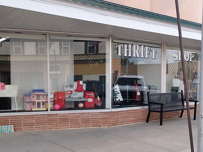 Ellis Community Thrift Shop's charming storefront window displays treasures waiting to be discovered by eagle-eyed shoppers.