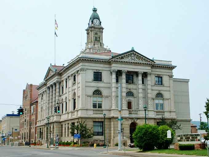 That grand courthouse commands respect with columns and clock tower, showing civic pride built to last through generations.