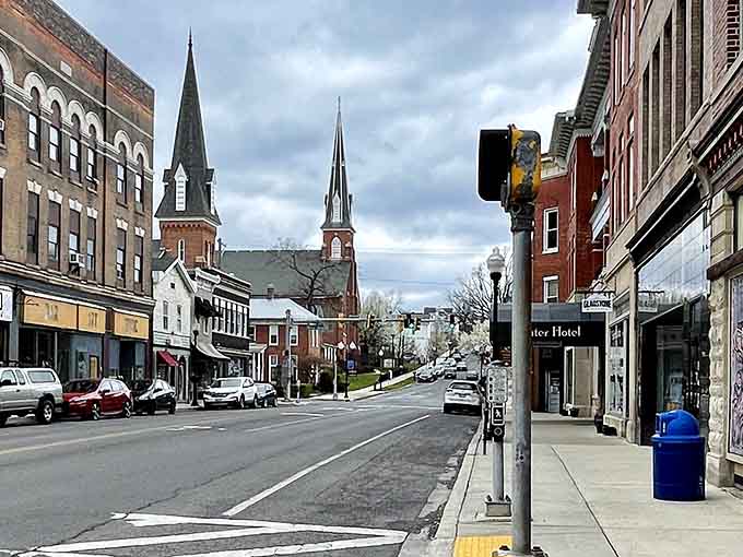 Twin church spires pierce the skyline like bookends, guiding you down streets where history and daily life intersect.