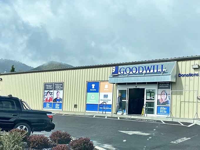 The corrugated metal exterior and mountain backdrop remind you that even practical buildings can hold extraordinary surprises.