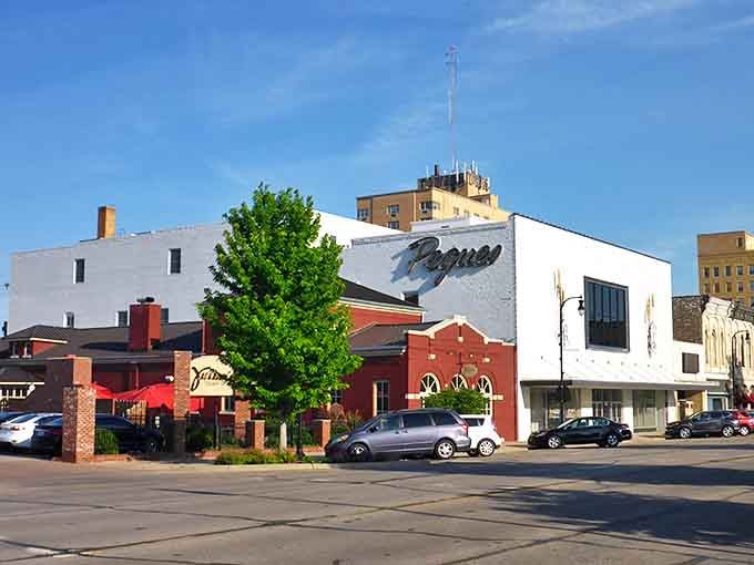 Downtown Hutchinson's historic Pegues building stands proudly, a brick-and-mortar testament to small-town Kansas charm that's aged like fine wine.