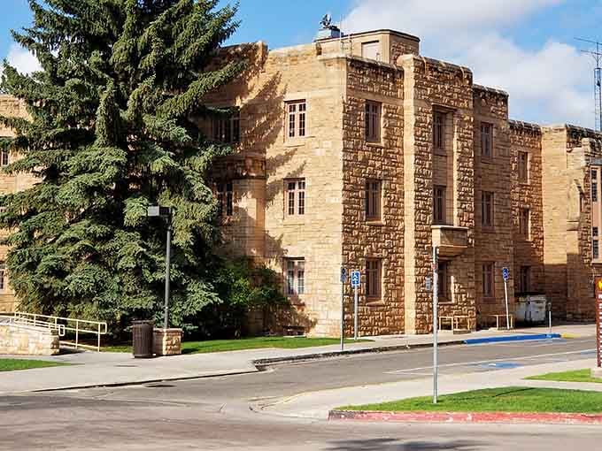 The historic Wyoming Territorial Prison in Laramie stands like a stone sentinel, its rugged walls whispering tales of the Wild West and Butch Cassidy.