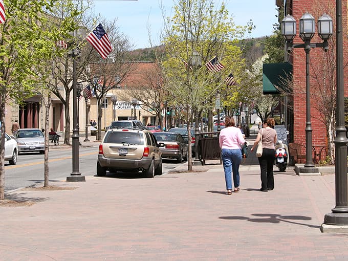 Tree-lined streets and vintage lampposts create the perfect setting for leisurely strolls and friendly neighborhood conversations.
