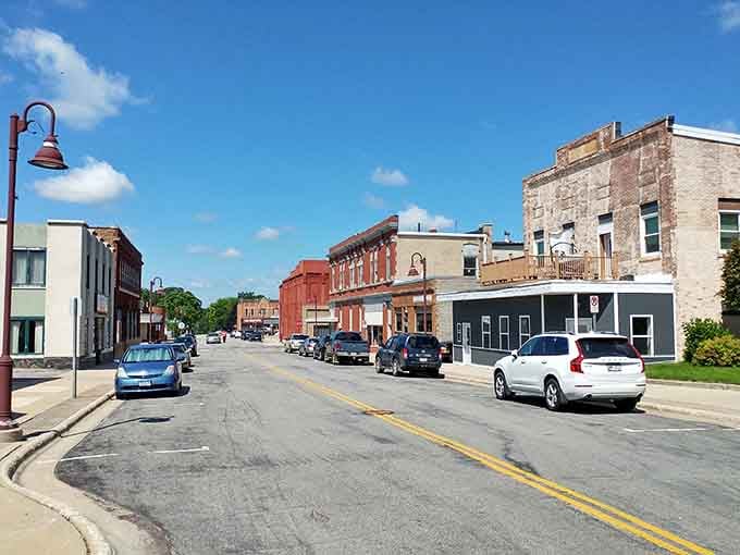 Tree-lined streets curve gently past historic storefronts where the biggest decision is which local cafe to visit for coffee.