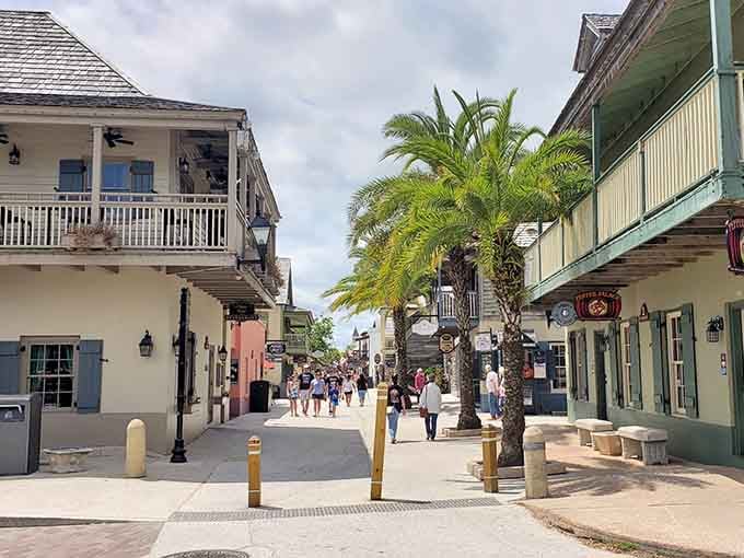 Palm-lined pedestrian streets invite leisurely strolls through a historic district where every balcony could tell a thousand tales worth hearing.