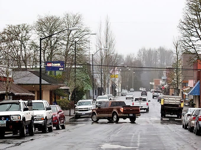 Misty morning streets create an atmospheric scene that feels like stepping into a nostalgic black-and-white photograph.