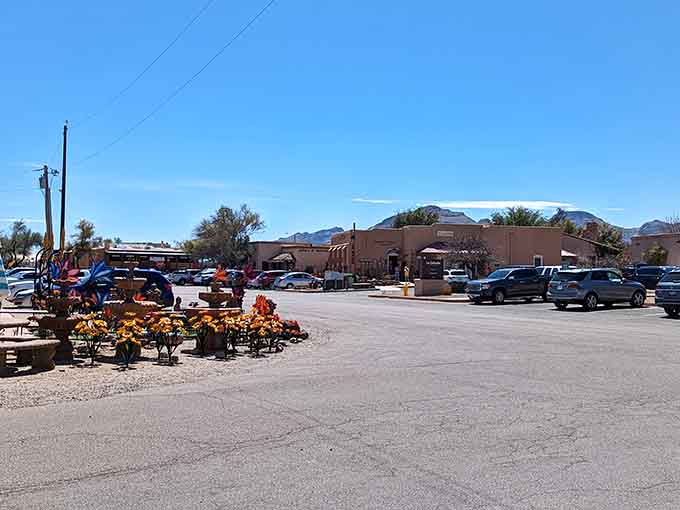 Desert mountains frame adobe-style buildings where art and history blend seamlessly in Arizona's creative southern corridor of charm.
