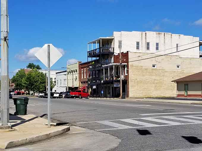 Historic balconies overlook the street like theater boxes, offering prime views of daily life's gentle parade below.
