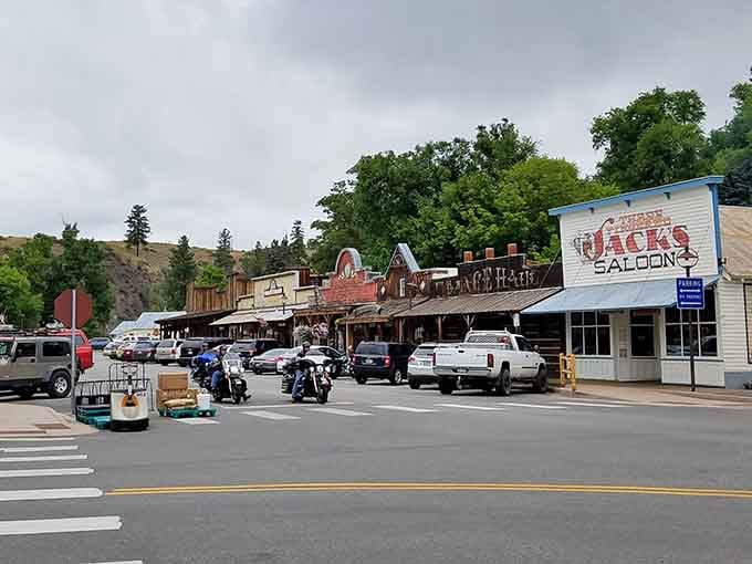 Weathered saloon signs and rustic buildings create an authentic frontier atmosphere that Clint Eastwood would appreciate nodding through.