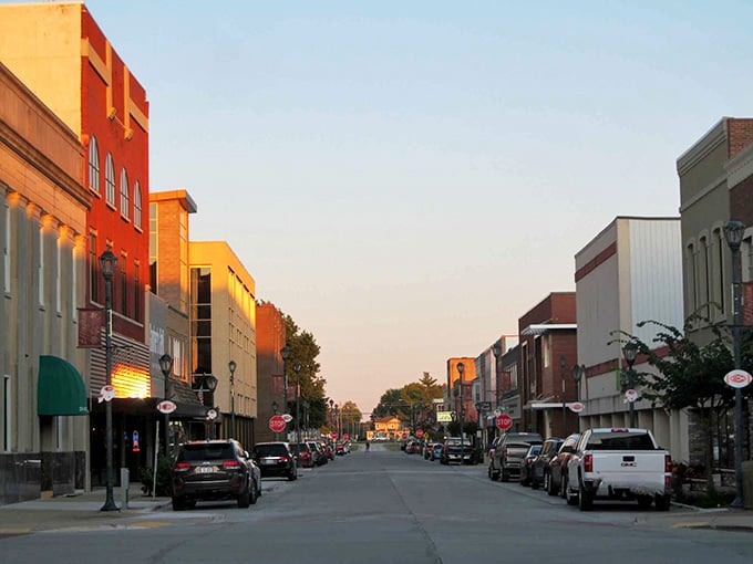 Sunset paints the buildings in shades of orange and pink, nature's way of showing off for the evening crowd.