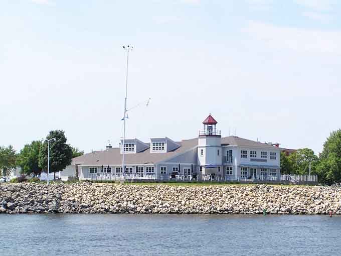 That lighthouse-topped building sits waterside like a beacon welcoming you to slow down and stay awhile.