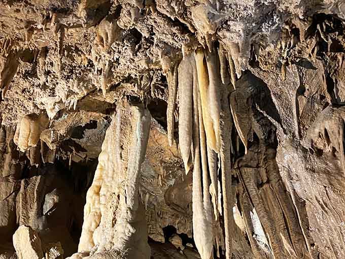 The cave's striped formations flow like frozen honey, creating an underground art gallery that never closes.