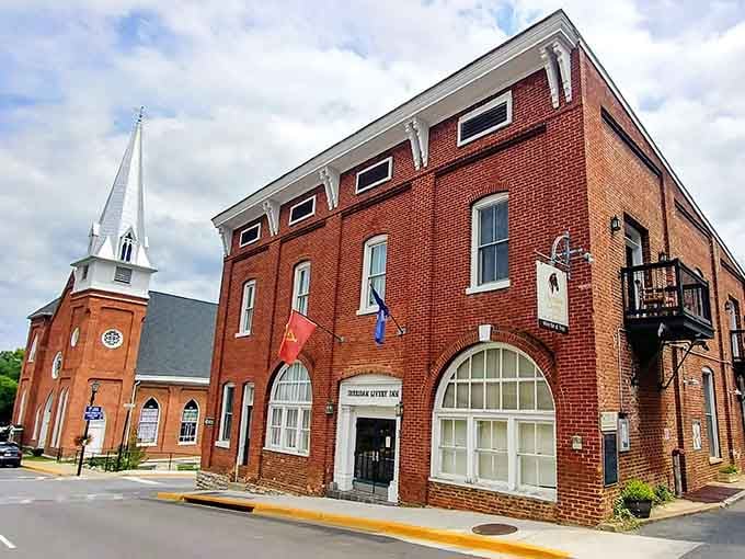 Arched windows and flags flying proud show that small-town fire stations anchor neighborhoods with history, safety, and genuine community spirit.