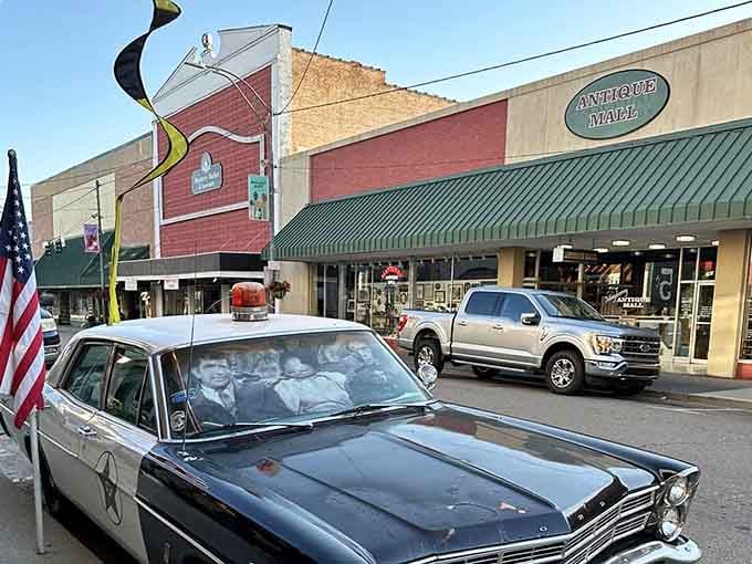 A vintage patrol car adds nostalgic charm, transporting visitors back to simpler times when life moved at a gentler pace.