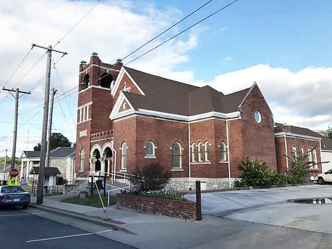 Red brick and arched windows give this church the kind of timeless beauty that money can't buy but faith built.