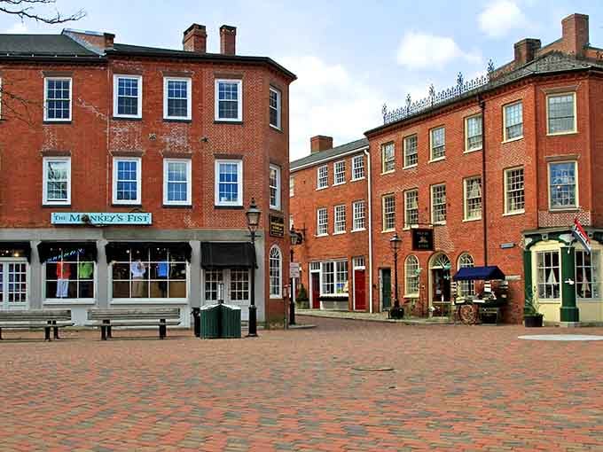 These Federal-era brick buildings form a plaza where cobblestones echo with footsteps from sailors, merchants, and modern-day explorers.