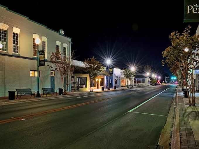 Night transforms the main street into a scene from your memory, quiet and glowing with timeless charm.