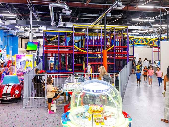 The massive play structure dominates the interior, its bright colors and multiple levels creating a maze of excitement.