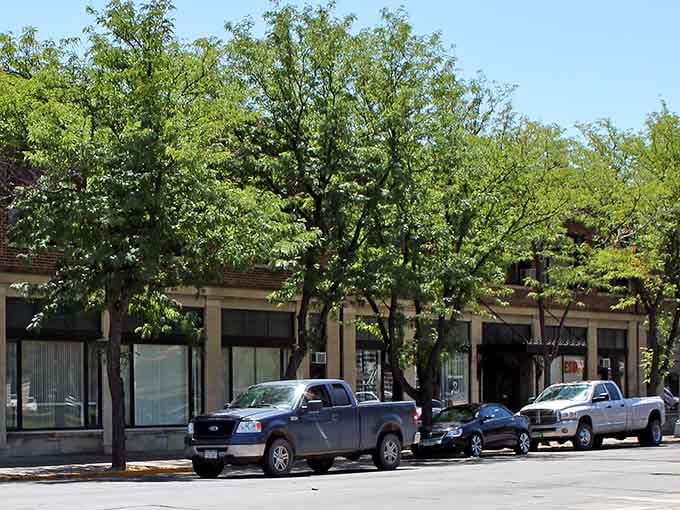 Those warm-toned buildings catching the afternoon sun glow like they're lit from within by pure nostalgia.