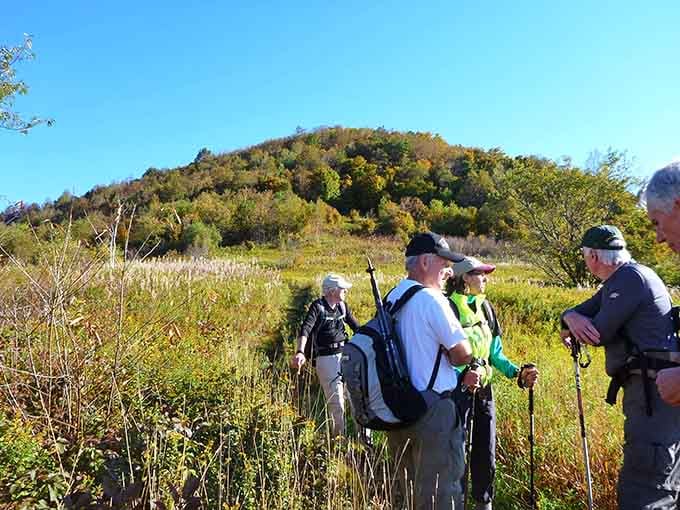 Fellow adventurers pause to take in views that remind you why getting out of bed this morning was worth it.
