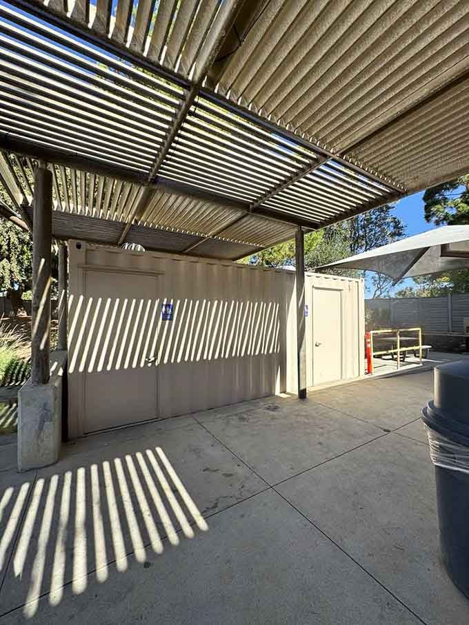 Even the facilities blend into the adventure aesthetic, proving thoughtful design extends to every corner of this remarkable space.