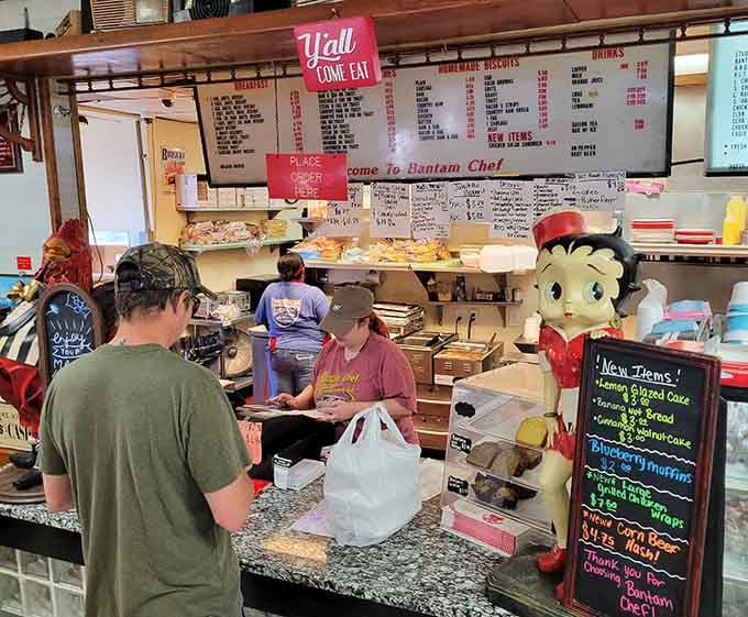 The order counter where magic happens, complete with a Betty Boop figurine overseeing the delicious operations daily.