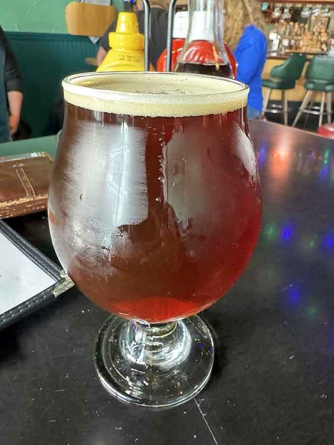 A proper Alaskan beer deserves a proper glass. This amber brew with its perfect head looks like it could tell stories about the local mountains.