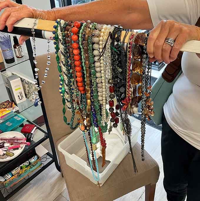 A rainbow of beaded possibilities dangling with potential. Each necklace tells a different style story waiting for its next chapter.