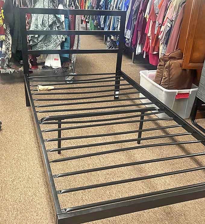 A bed frame waiting for its next home. Practical, sturdy, and priced so reasonably you'll wonder why anyone buys new.