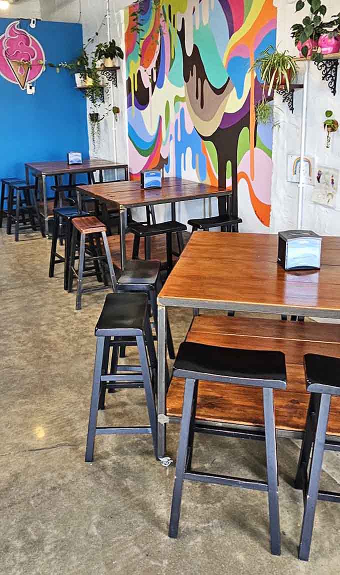 Bright abstract murals add personality to the space without competing with the real star: your lunch plate.