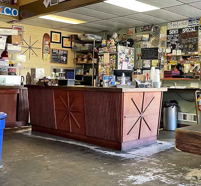 The counter where burger dreams become reality, complete with enough vintage charm to make your grandparents nostalgic.
